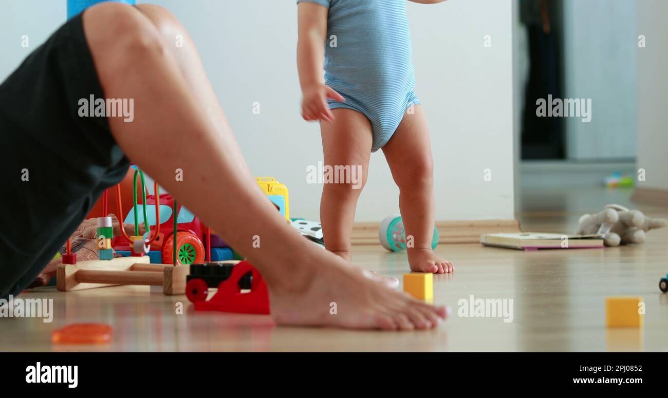 Happy baby dancing, joyful child one year old toddler boy dance moving ...