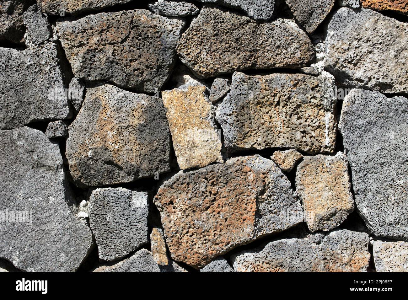 Wall of volcanic stone, Mauritius Stock Photo - Alamy