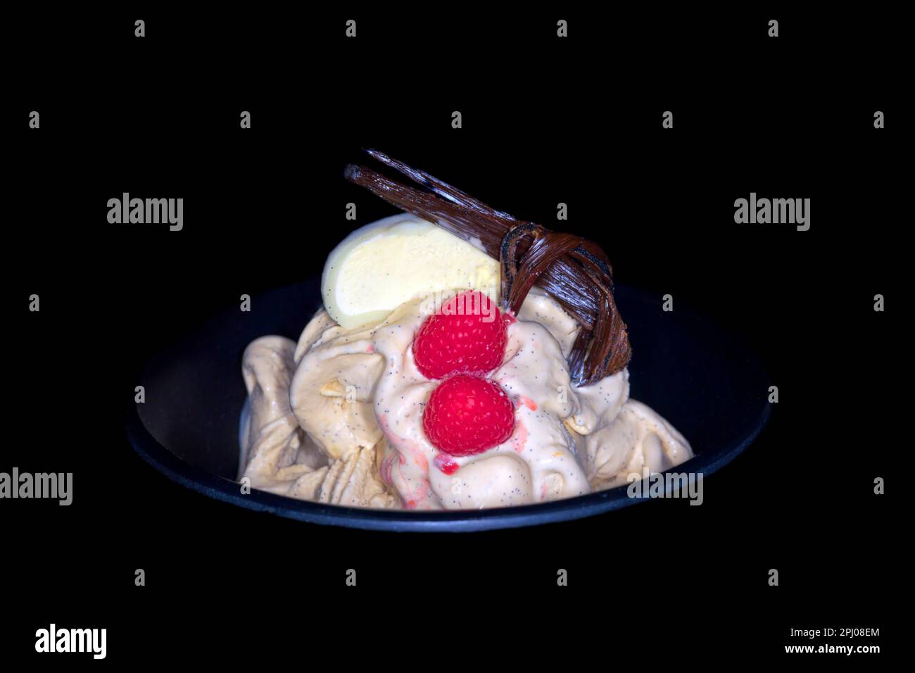 Vanilla ice cream with fresh Mauritius vanilla, raspberries, knotted ...