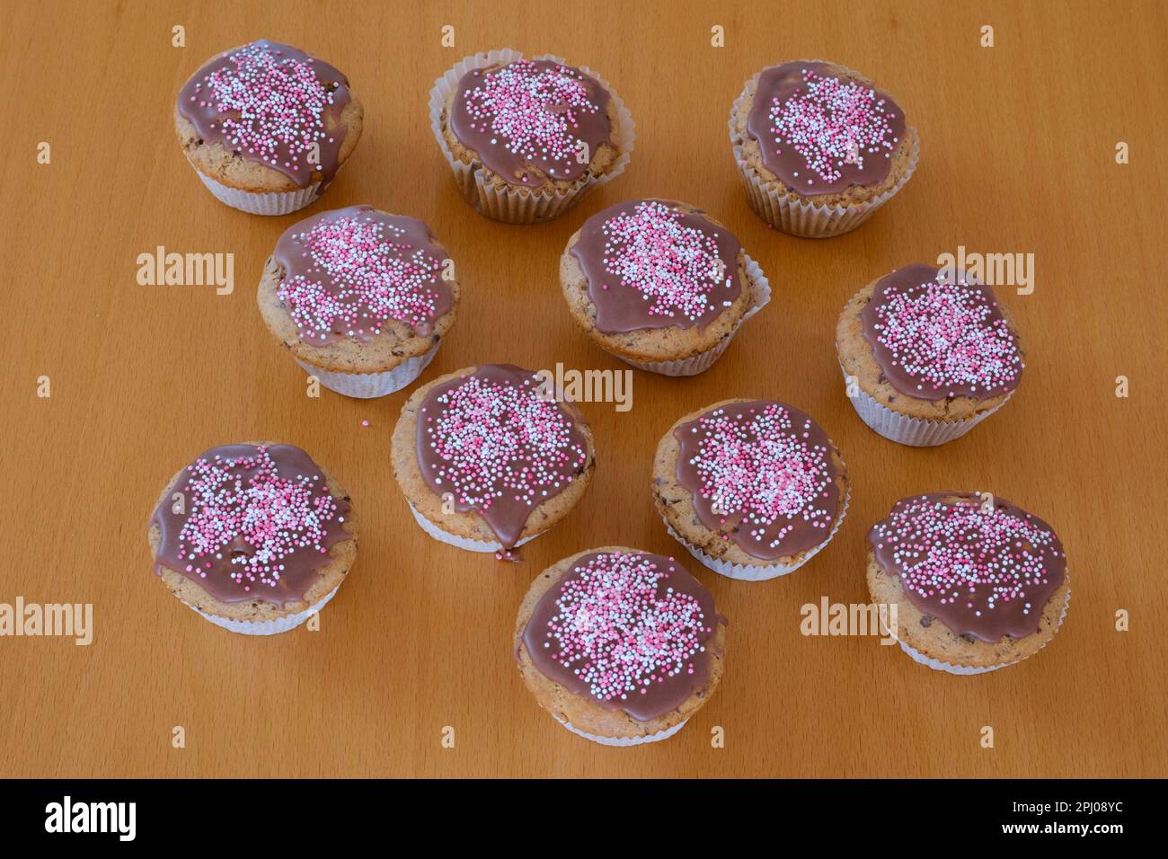 Homemade muffins with colourful sprinkles Stock Photo - Alamy