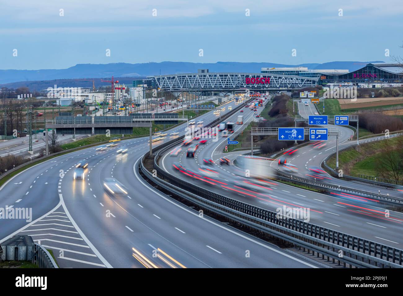 A8 motorway at the airport, the Bosch multi-storey car park spans the ...