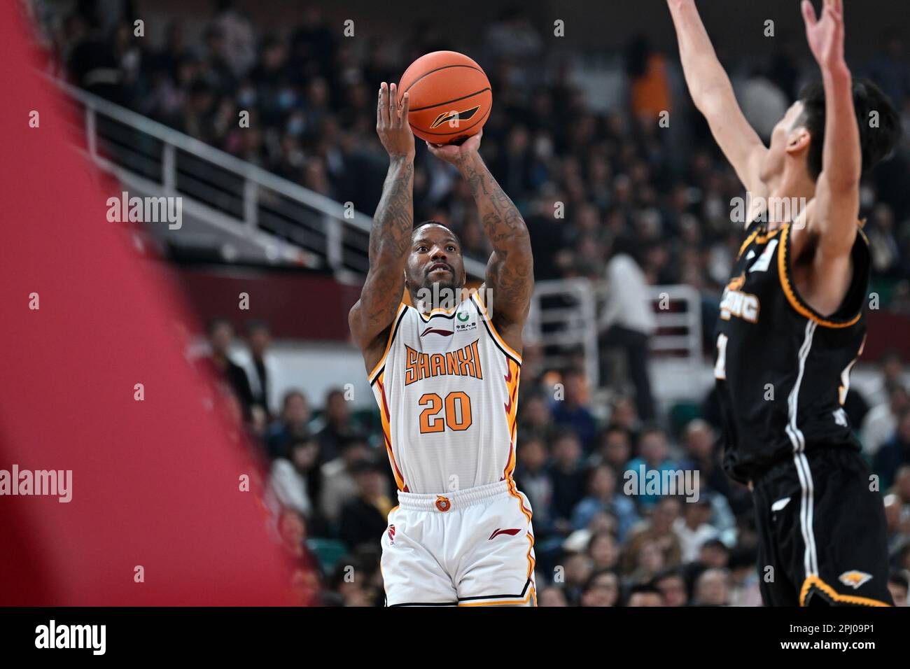 Taiyuan, China's Shanxi Province. 30th Mar, 2023. Kay Felder (L) of ...