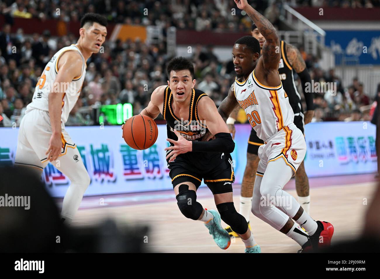 Taiyuan, China's Shanxi Province. 30th Mar, 2023. Guo Ailun (C) of ...