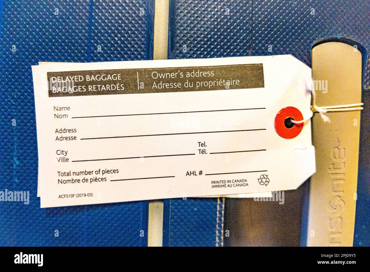 Lost baggage tag Stock Photo - Alamy