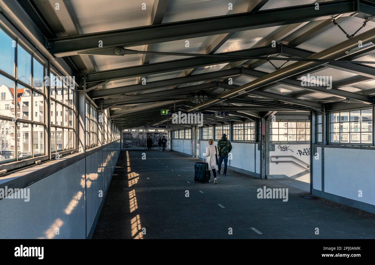 Travellers, connecting bridge at Ostkreuz station, Friedrichshain ...