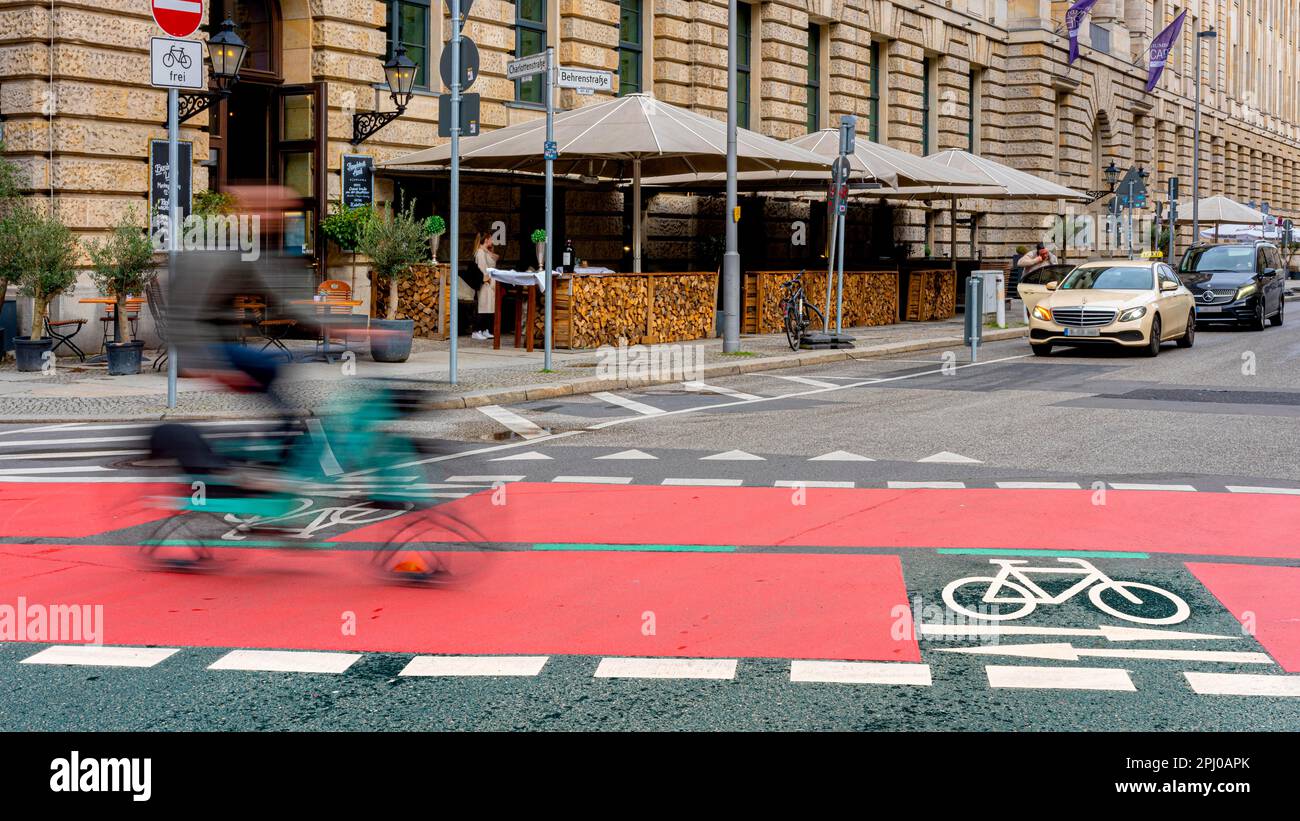 Red special lane for cyclists, Charlottenstrasse, Berlin-Mitte, Germany ...