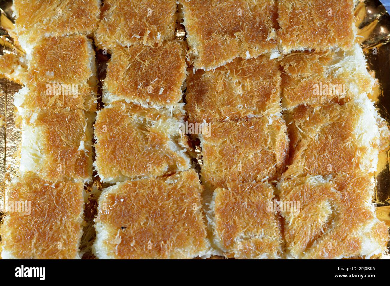 A traditional middle eastern dessert Knafeh Konafa made with spun ...