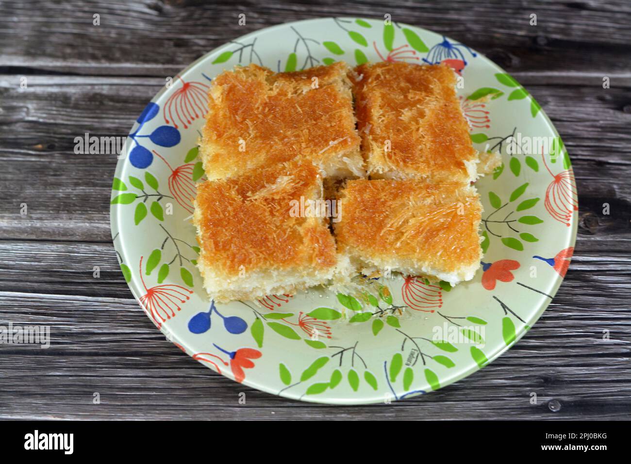 A traditional middle eastern dessert Knafeh Konafa made with spun ...