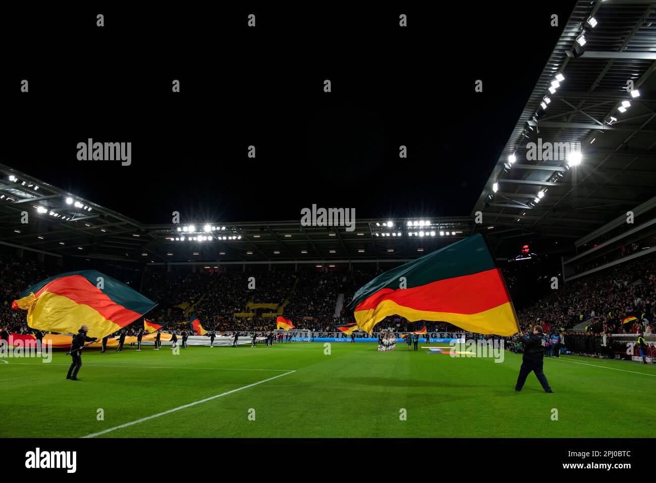 Flag wavers, flag wavers, waving flags, flags, Germany flag, in front ...