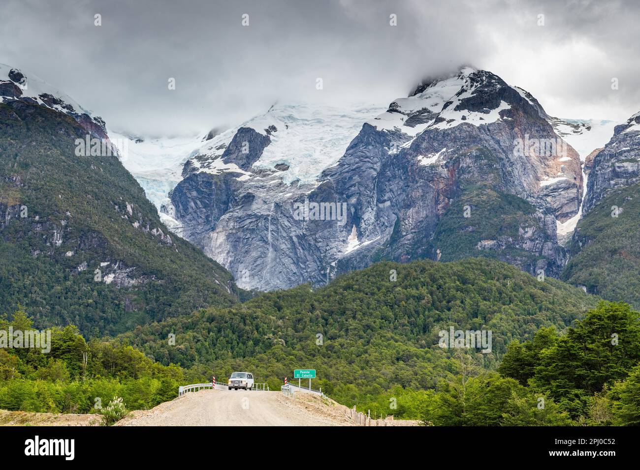Car on a bridge over the Exploradores River, Cerro Caballo mountain in ...