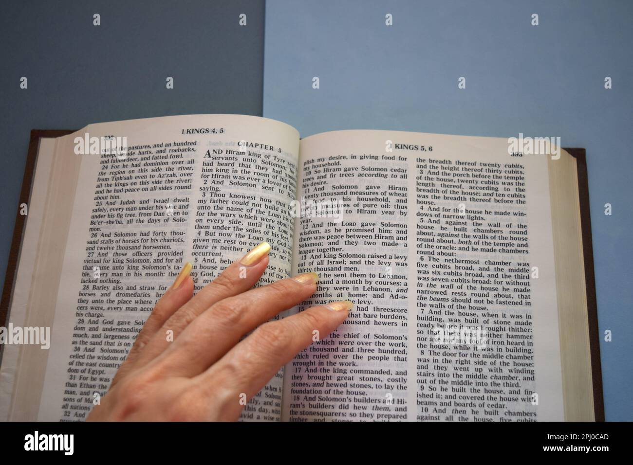 Person is reading a Bible Stock Photo - Alamy