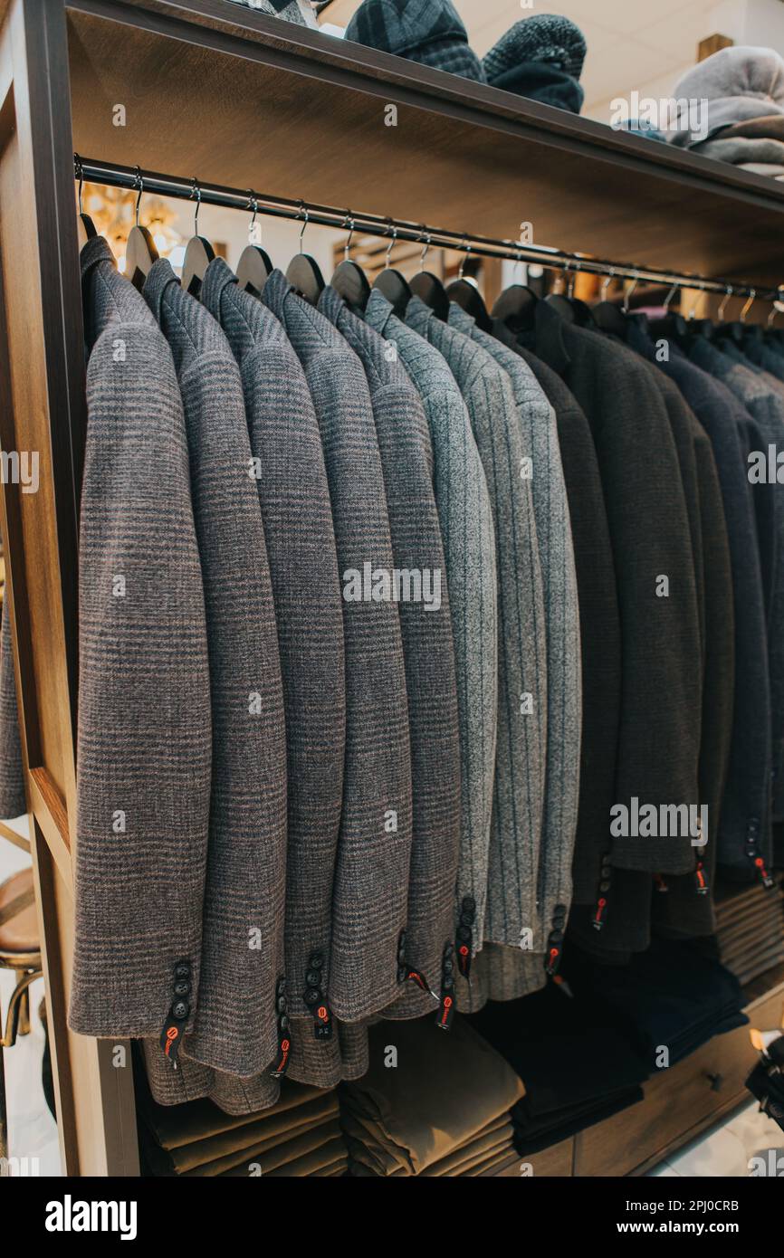 Rack of mens suits hi-res stock photography and images - Alamy