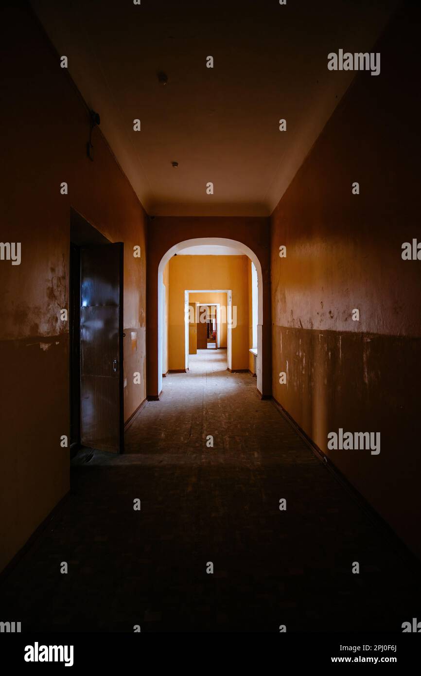 Dark dirty corridor of old abandoned school Stock Photo - Alamy