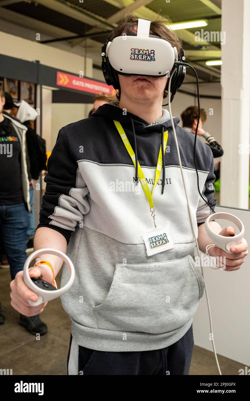 London, UK. 30 March 2023. A visitor plays the virtual reality game ...