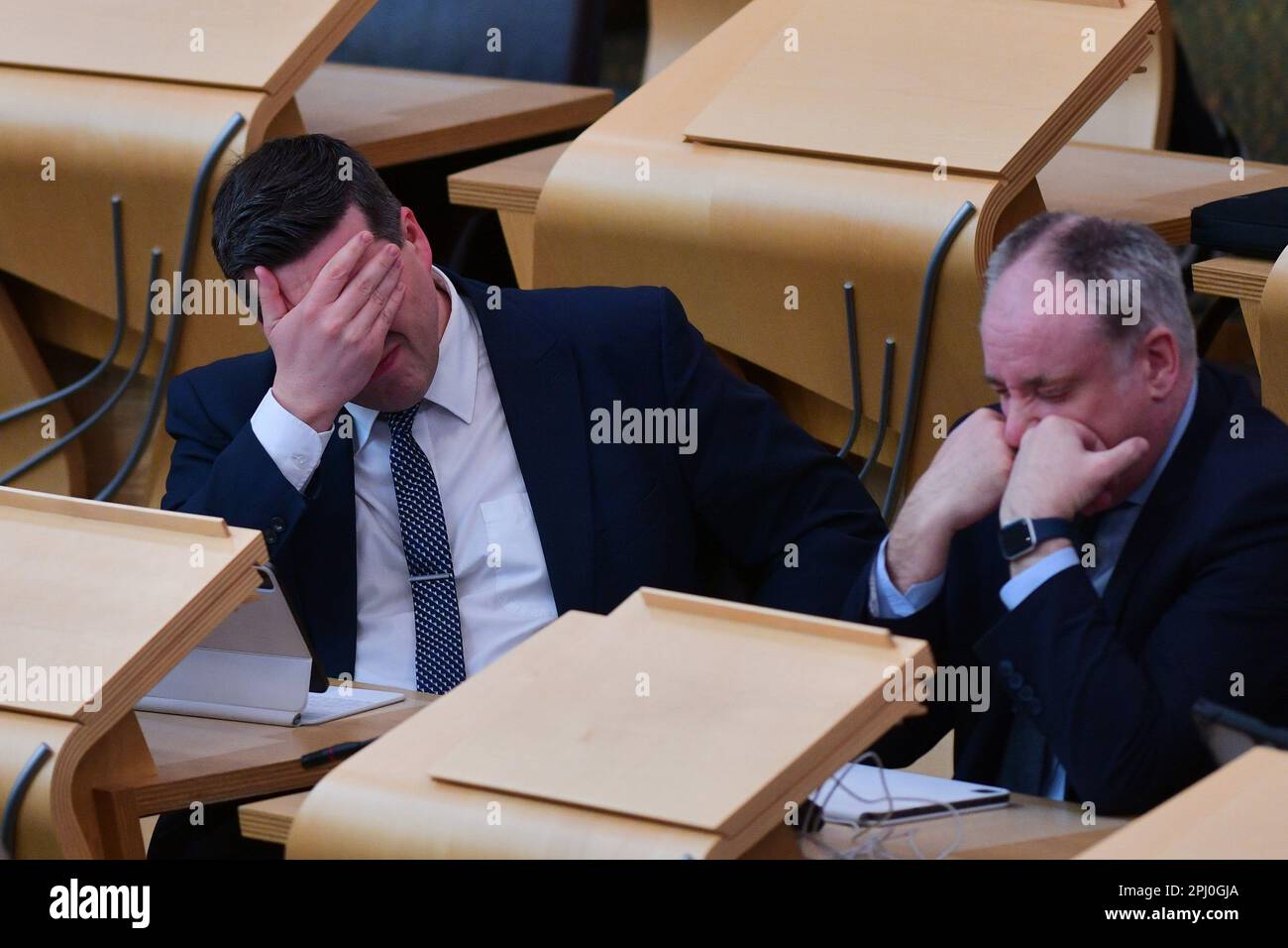 Edinburgh Scotland, UK 30 March 2023. Jamie Hepburn (left) was ...