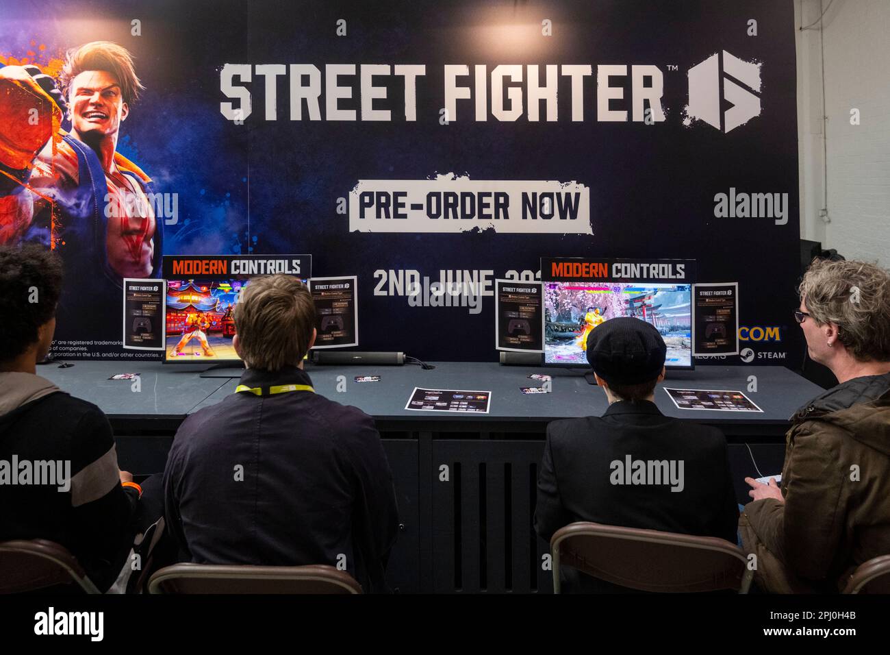 London, UK. 30 March 2023. Visitors play the upcoming 'Street Fighter 6 ...