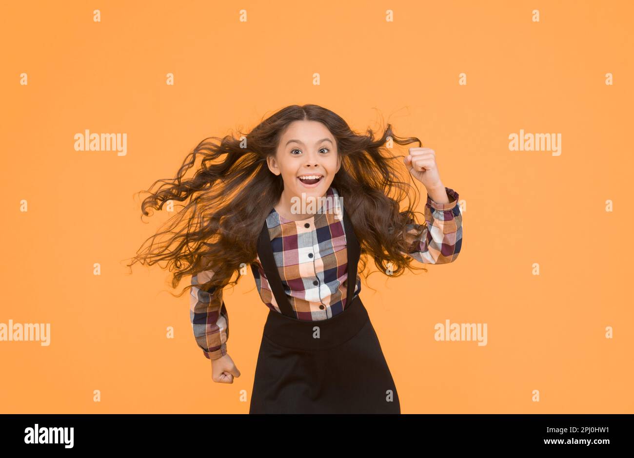 Air in her hair. natural beauty. Girl kid long hair flying in air ...