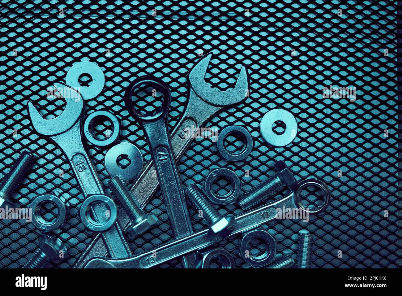 Set of chrome wrenches on steel surface. Mechanic tools for maintenance ...