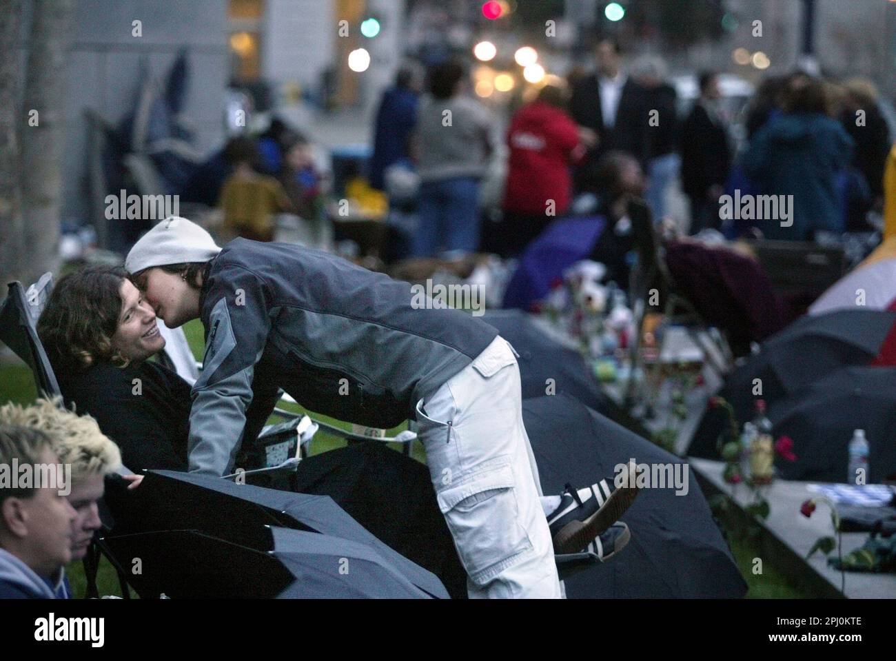wedding 002 LS.JPG Anna Gregroy and Hillary Hartley share a kiss from ...
