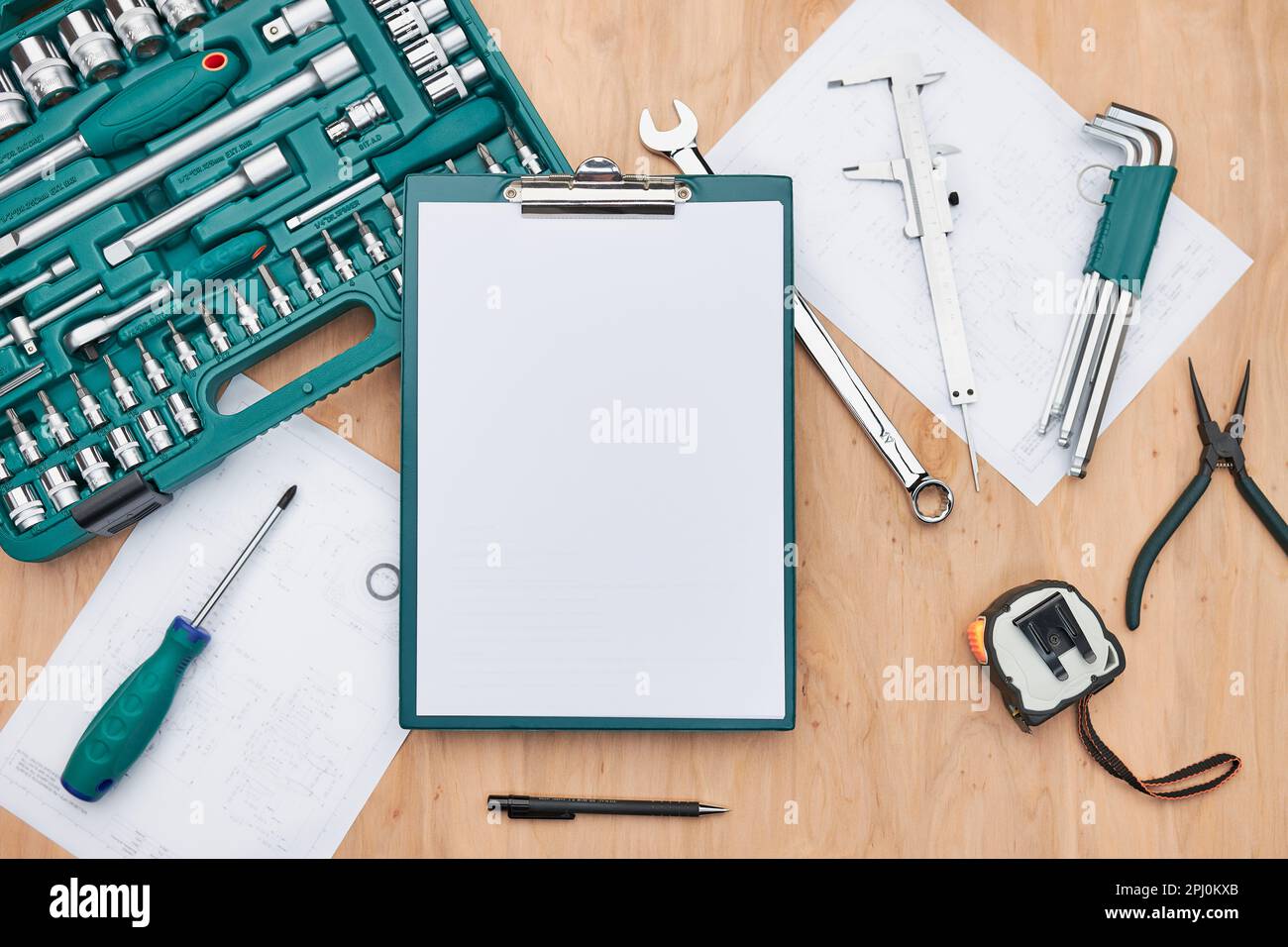 Workshop table with many tools. Wrench, spanner, calliper and ratchet ...