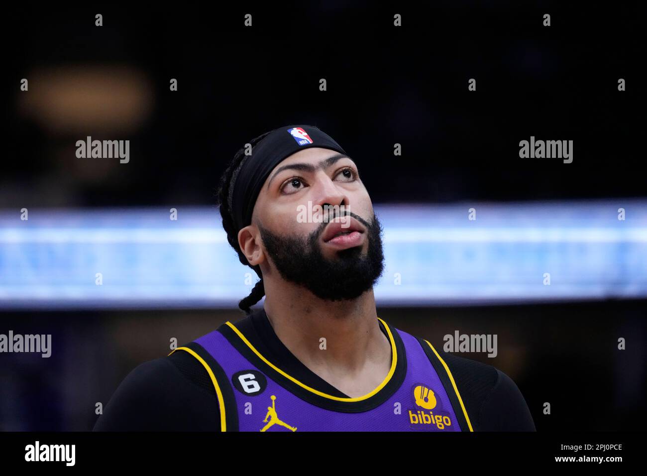 Los Angeles Lakers' Anthony Davis walks across the court during an NBA basketball game against ...