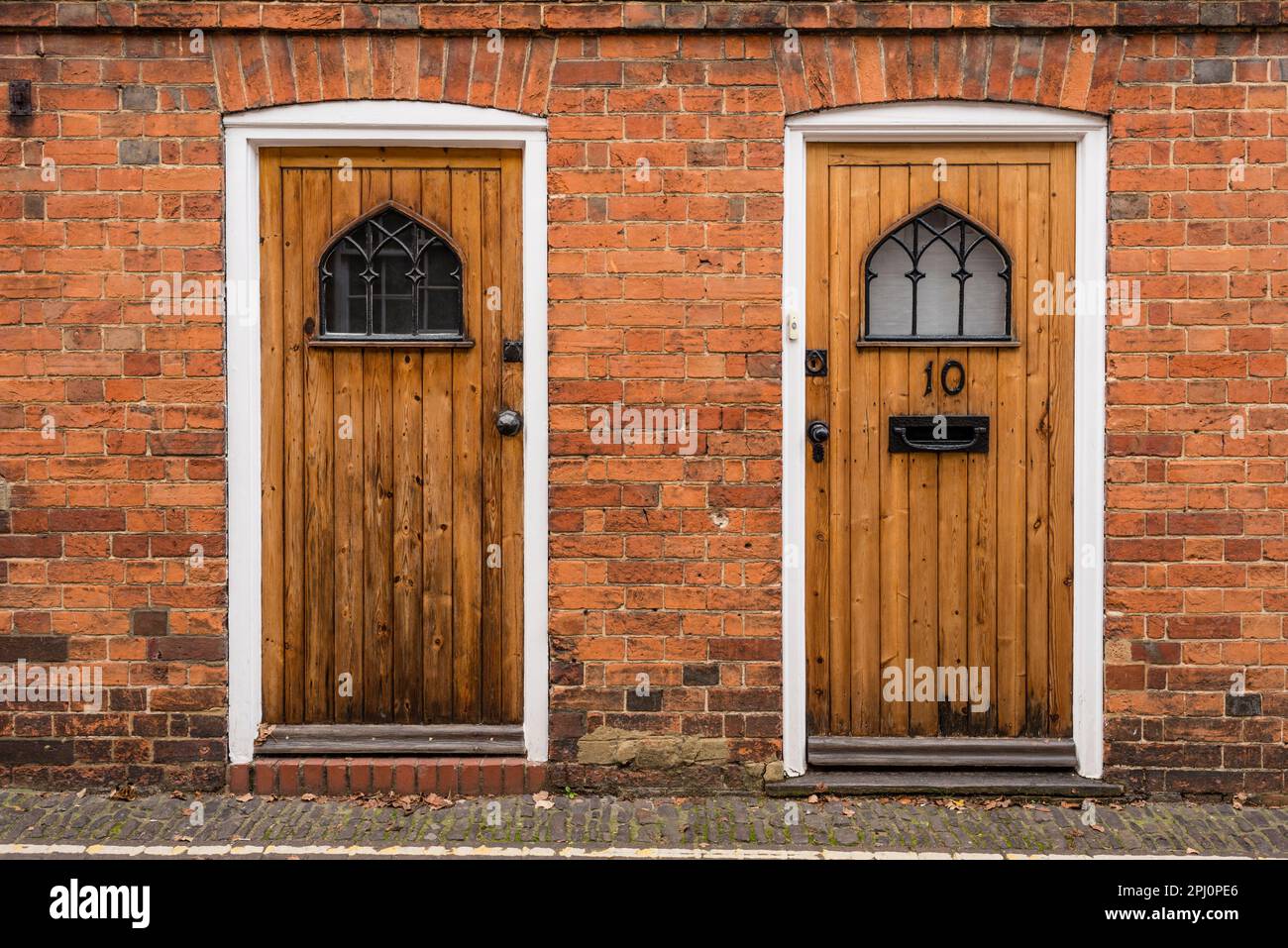Two fronts doors side by side, Farnham, Surrey, UK Stock Photo - Alamy