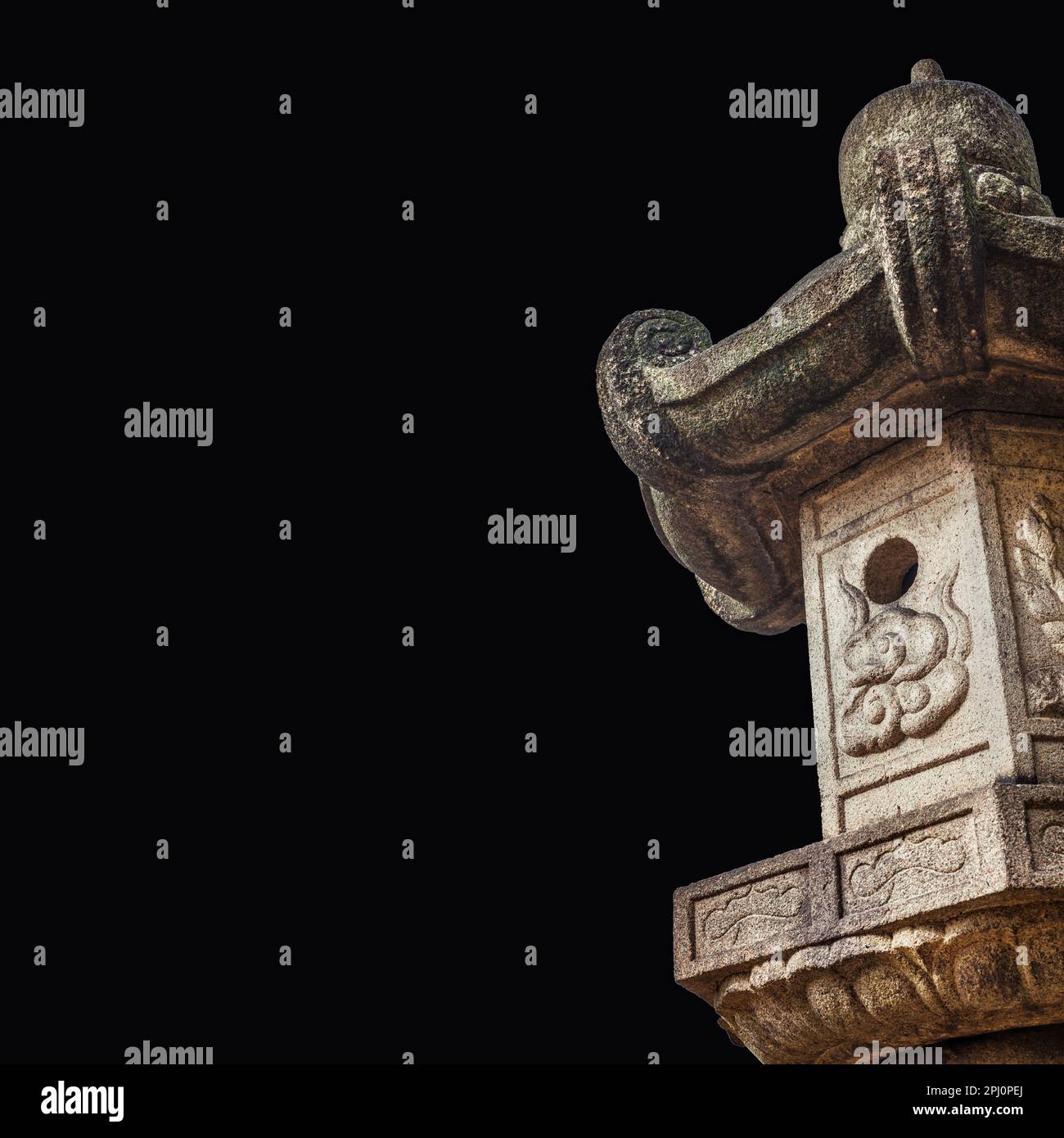 Old traditional japanese stone lantern, a type often find in gardens ...