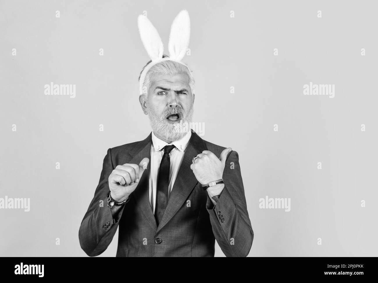 Funny boss. Easter activities for office. Businessman wear bunny ...