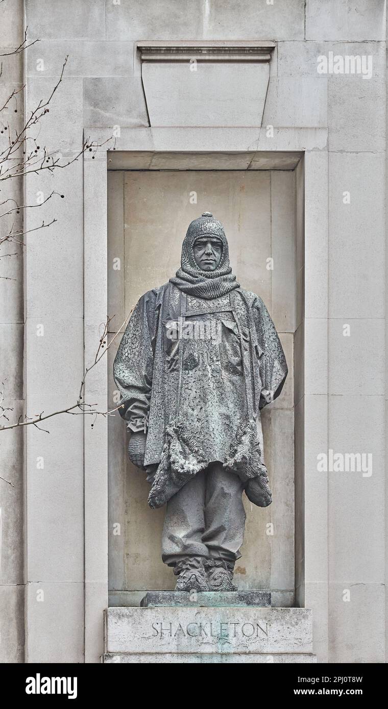 Statue of the explorer Shackleton on an outside wall of the Royal ...