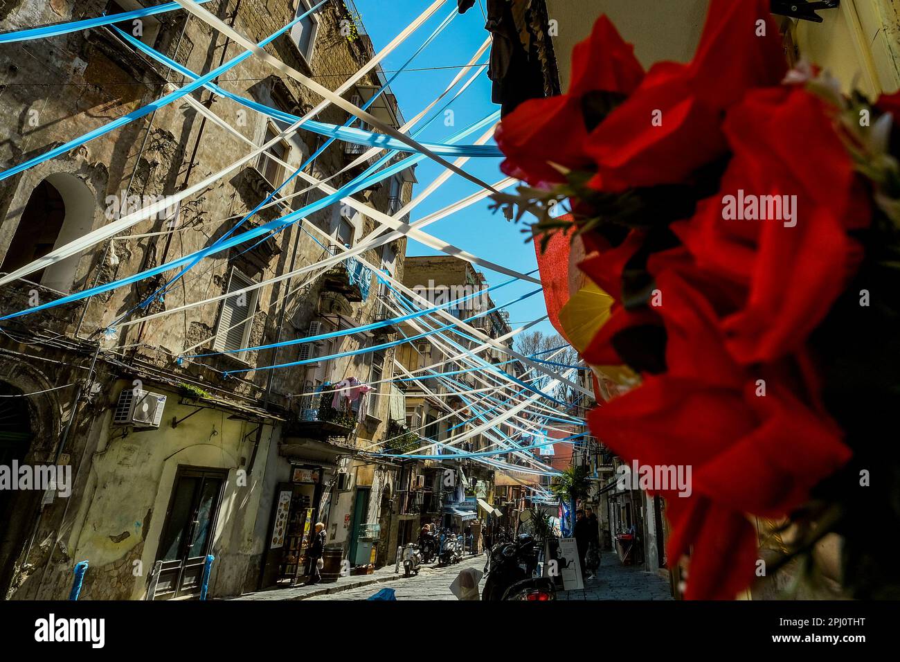 Banners and ribbons with the colors of the SSC Napoli soccer team are ...