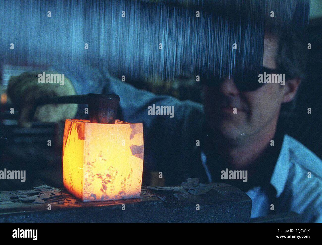 STEEL 1-19AB/C/03MAR97/CD/LS Jefferson Mack works an air hammer that ...