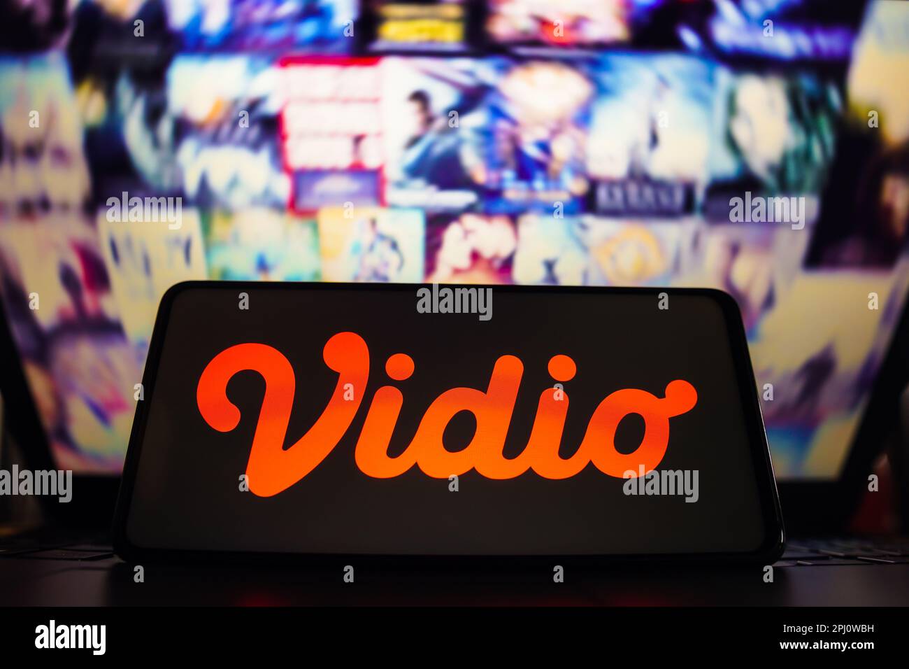 In this photo illustration, the Vidio logo is displayed on a smartphone ...