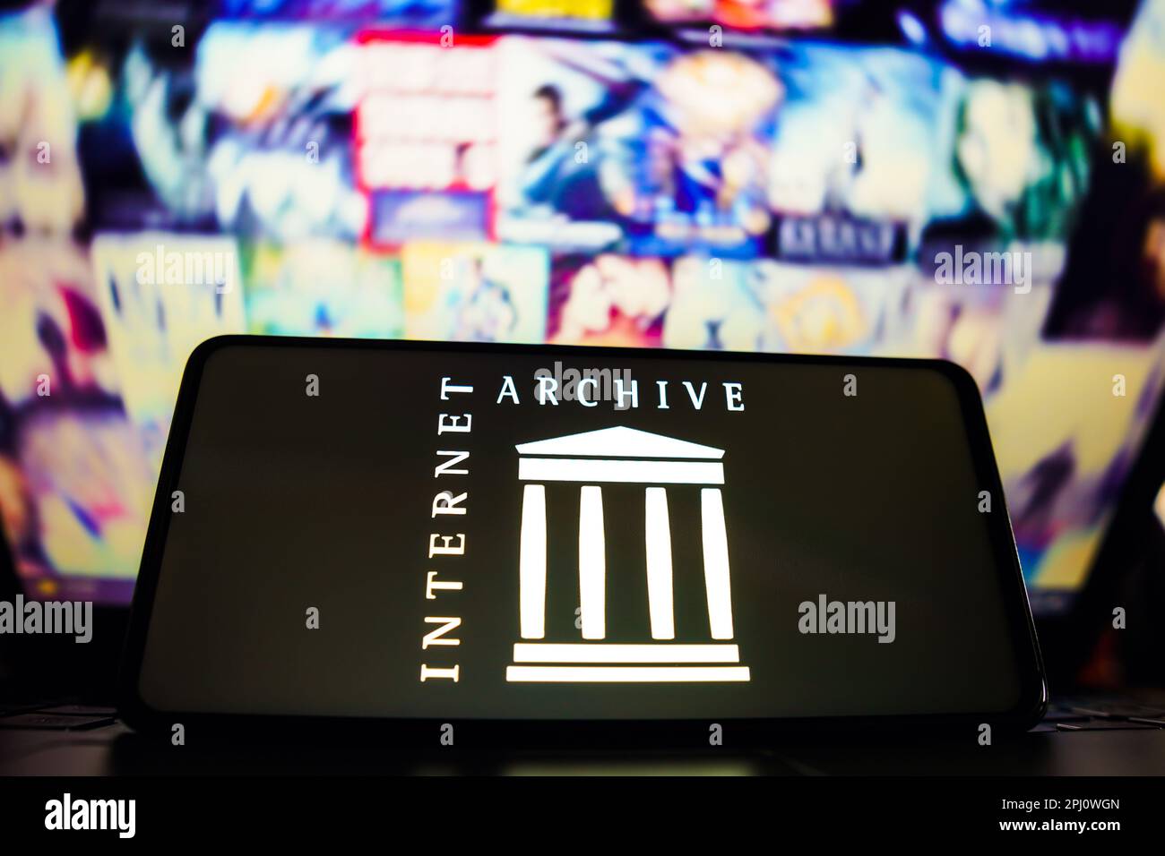 In this photo illustration, the Internet Archive logo is displayed on a ...
