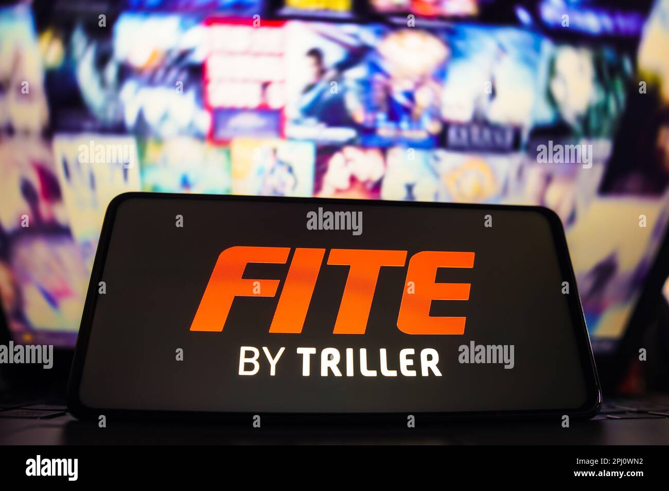 In this photo illustration, the FITE logo is displayed on a smartphone ...