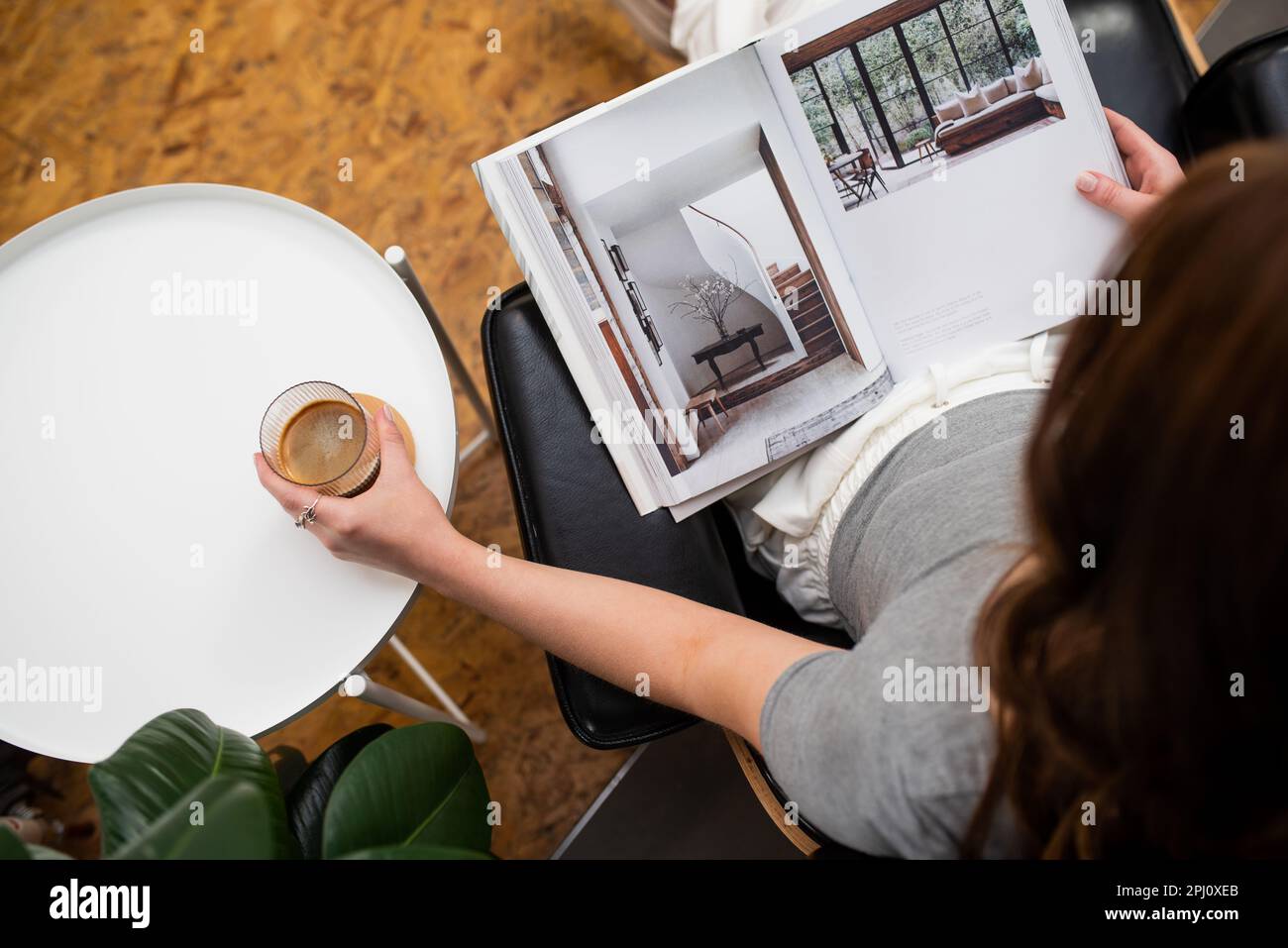 Girl reading magazine drinking coffee hi-res stock photography and ...