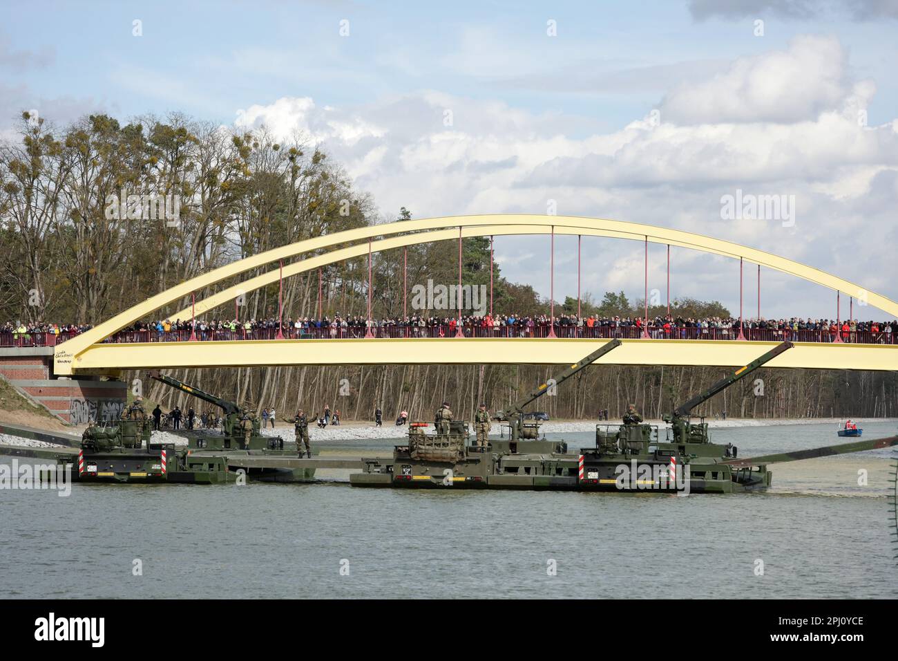Finowfurt, Germany. 30th Mar, 2023. Spectators standing on a footbridge ...