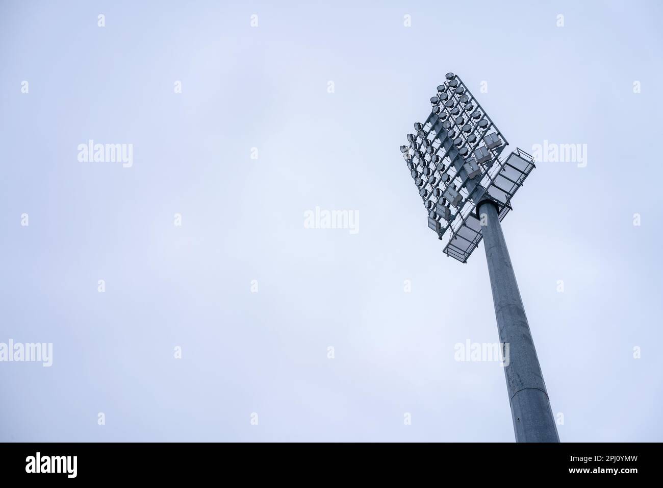 Stadium light tower against the sky with copy space Stock Photo - Alamy