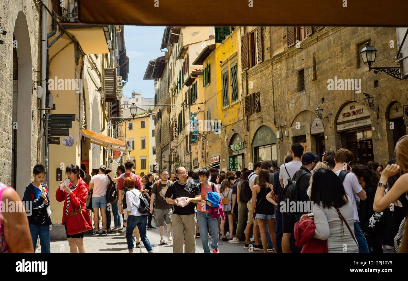 A long line of lunchtime visitors queues up for panini from a popular ...