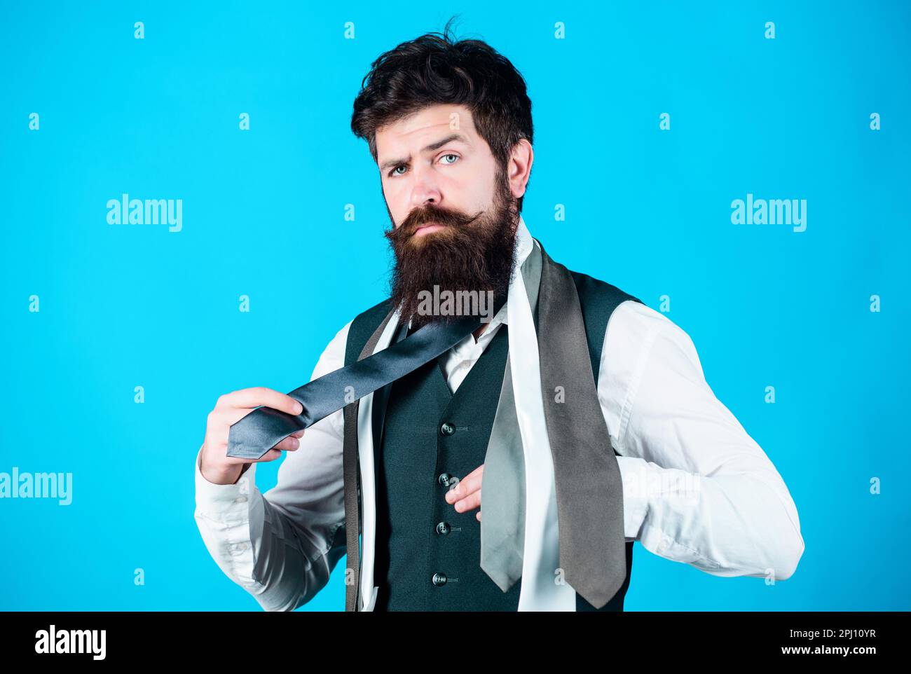 How to match necktie with shirt and suit. Man bearded hipster hold few ...