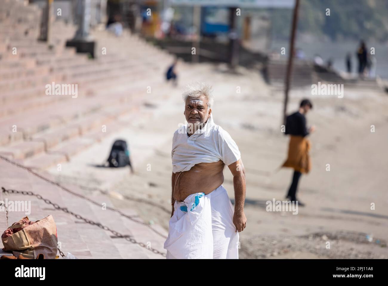Holy Rishikesh, Portrait of unidentified old brahmin male walking near ...