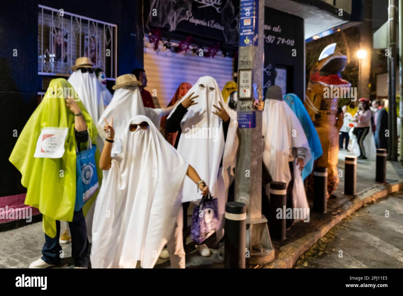 Halloween in Mexico City. People with halloween ghost costumes asking ...
