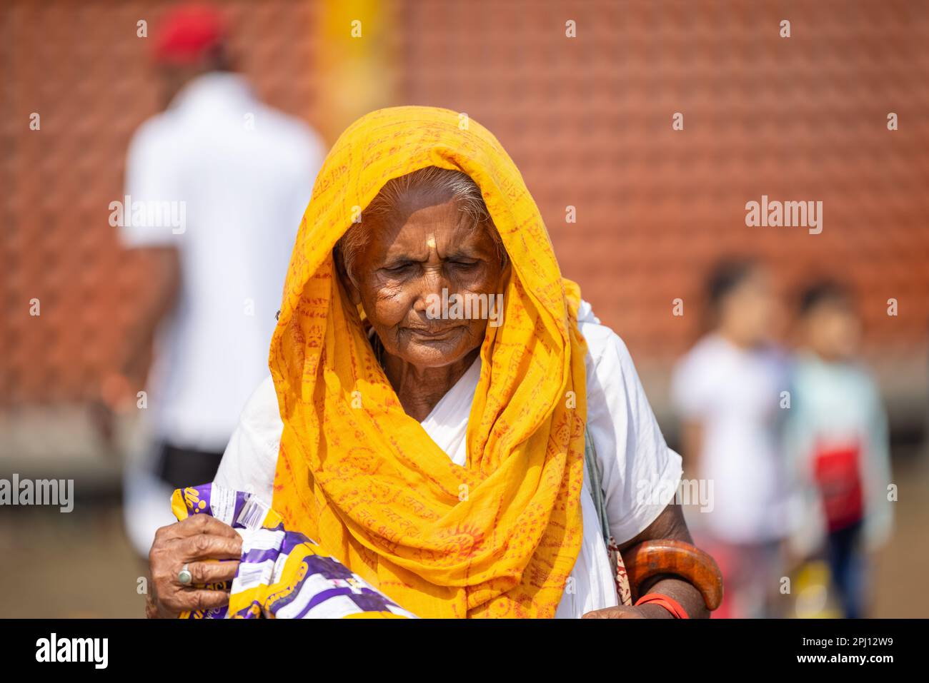 Holy Rishikesh, Portrait of unidentified brahmin old female near river ...