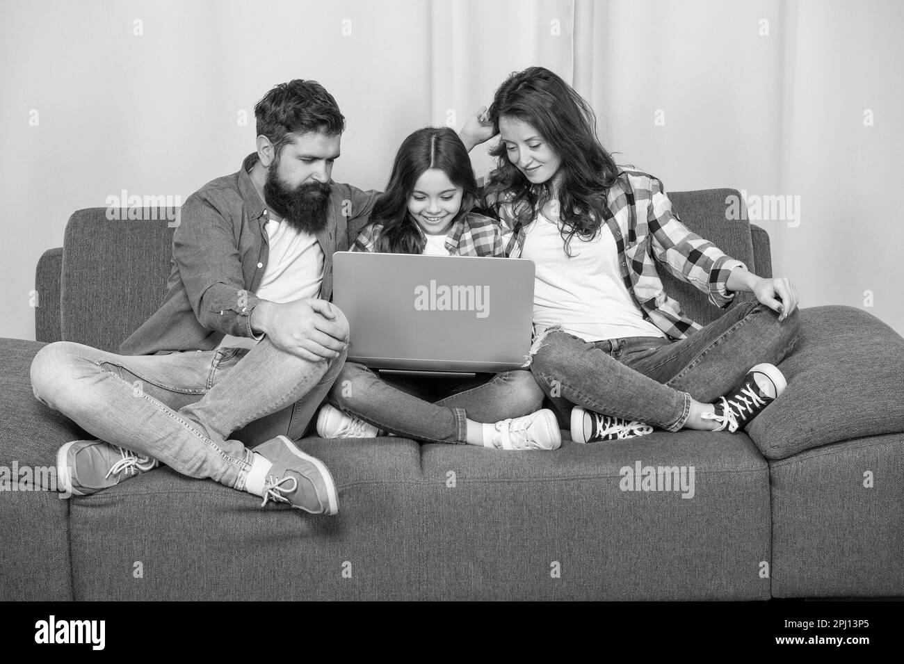 family blog. happy parents with kid girl study online. mom dad and ...