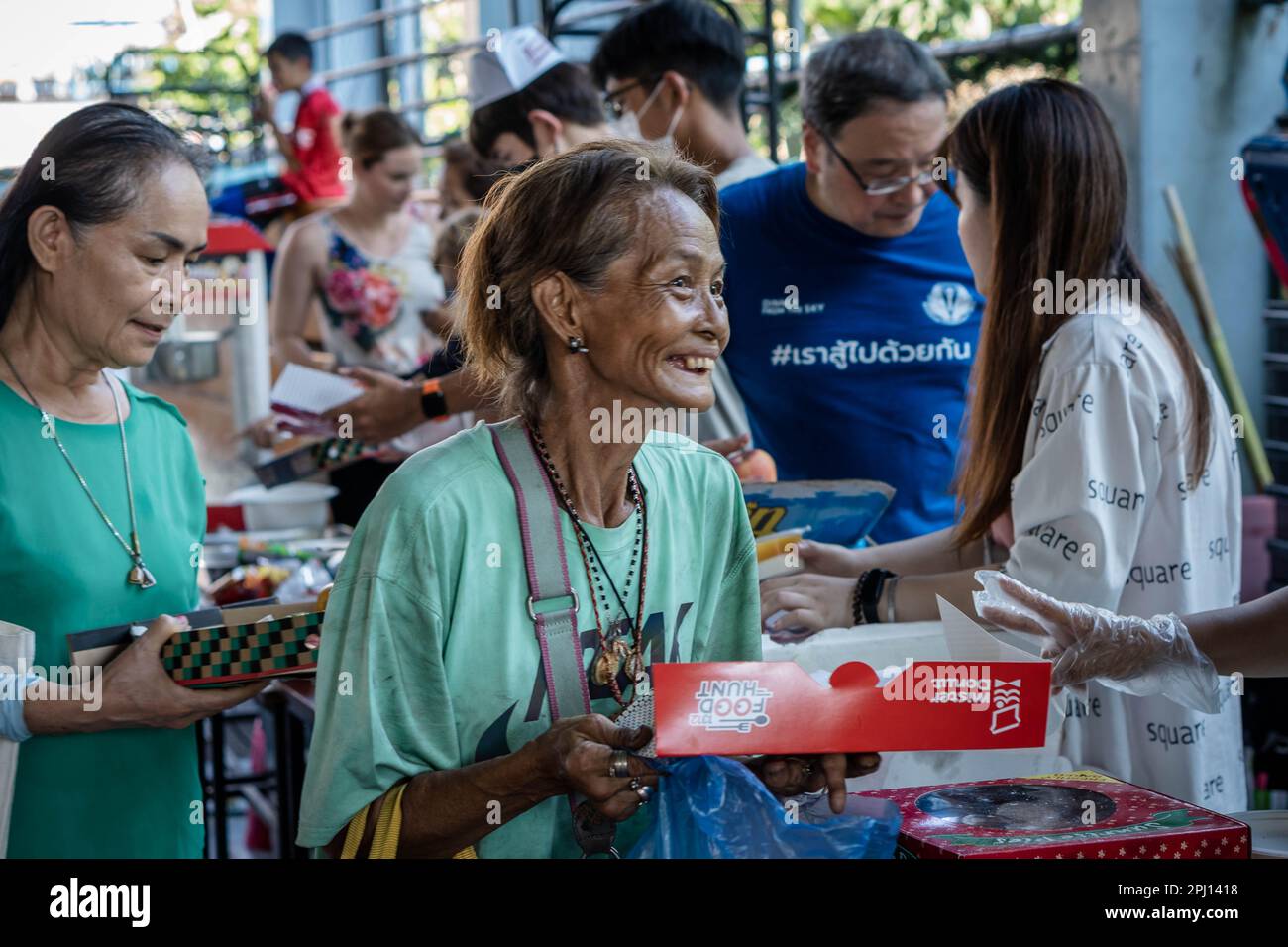 An elderly person from the Rong Moo community, a low-income area in the ...