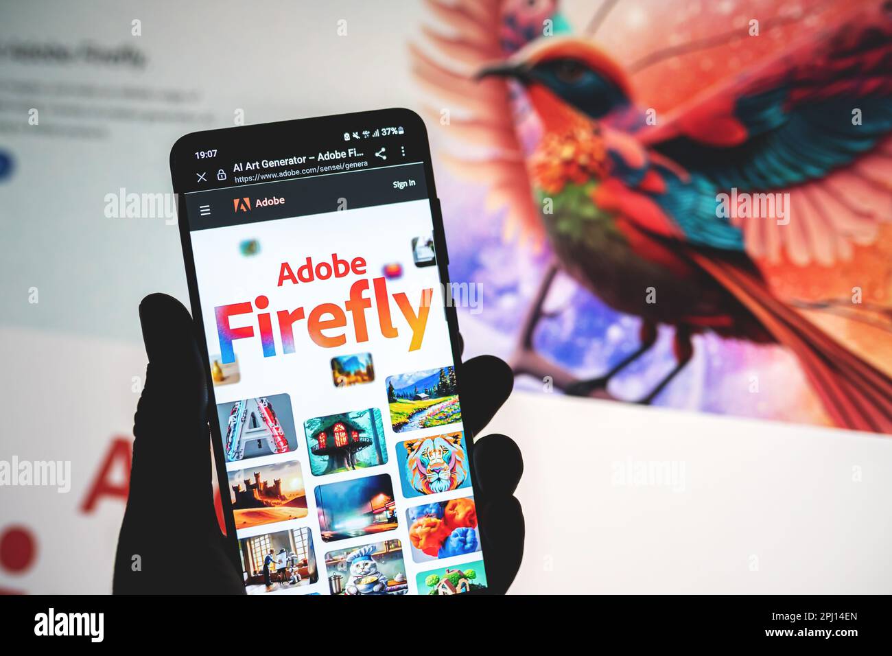 Adobe Firefly Website seen on phone screen. Adobe announced the beta launch of its AI Art ...