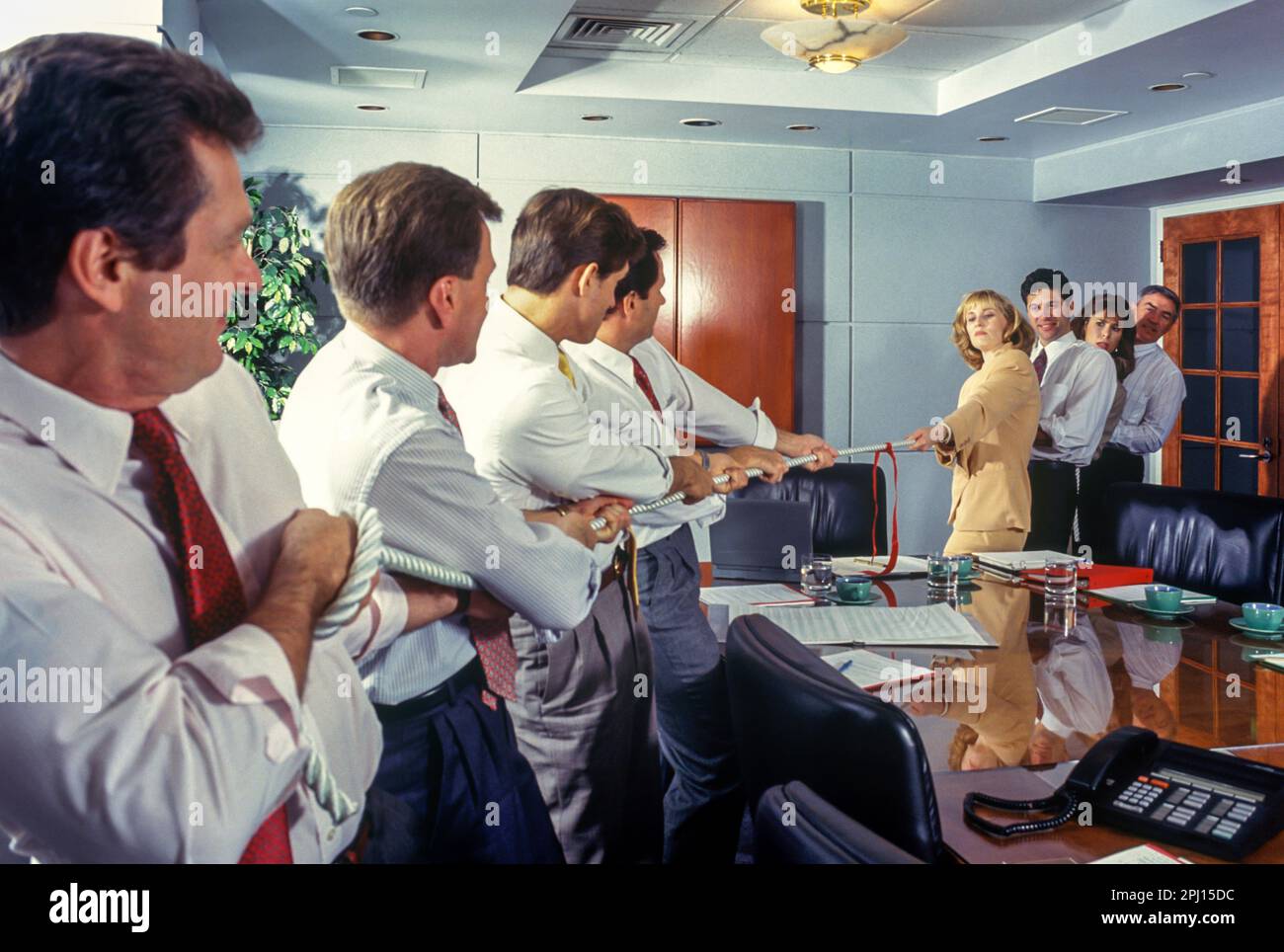1994 HISTORICAL GROUP OF OFFICE WORKERS AT TUG OF WAR Stock Photo - Alamy