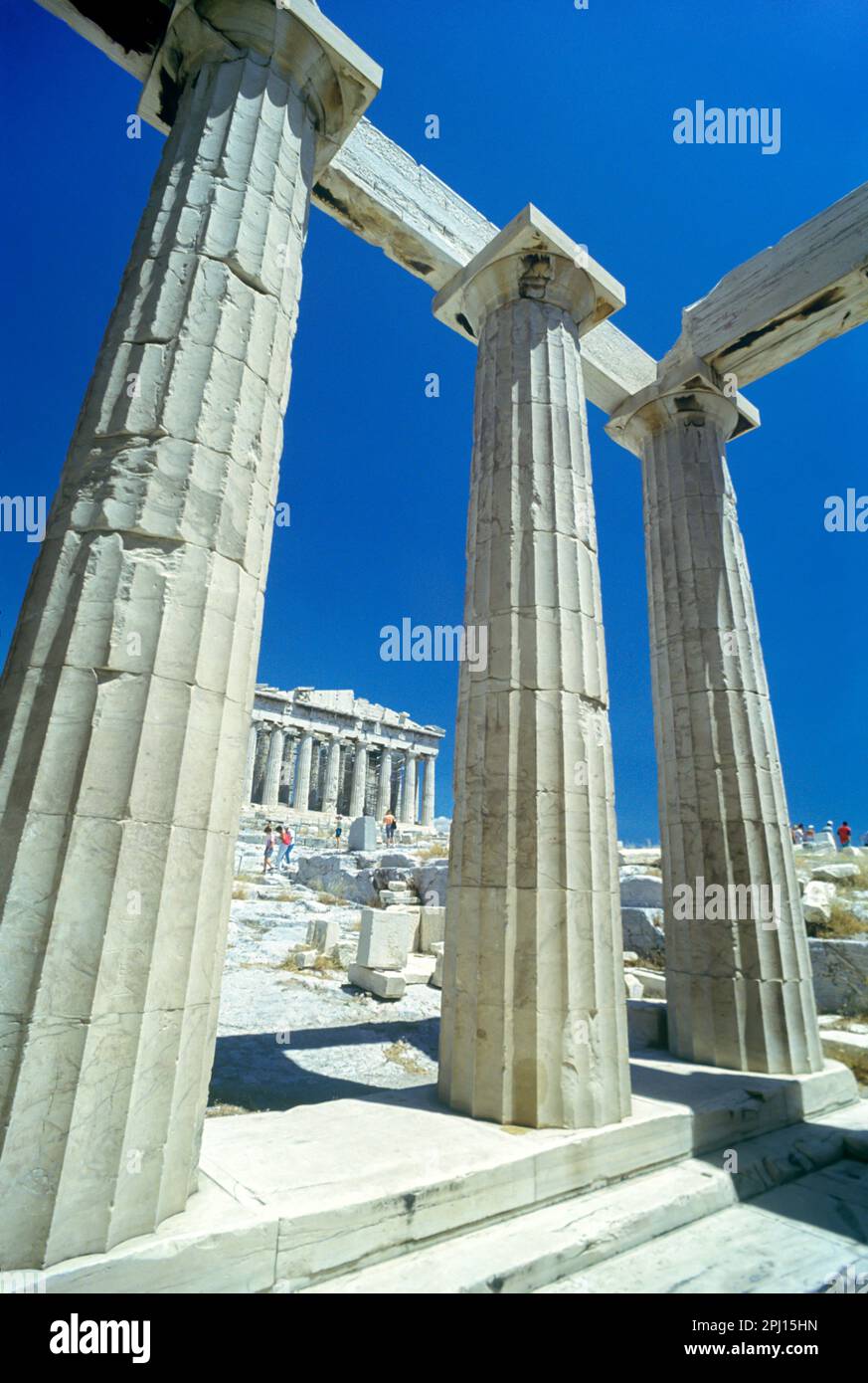 DORIC STONE COLUMNS PROPYLAEA COLONNADE AND PARTHENON ACROPOLIS RUINS ATHENS GREECE Stock Photo ...
