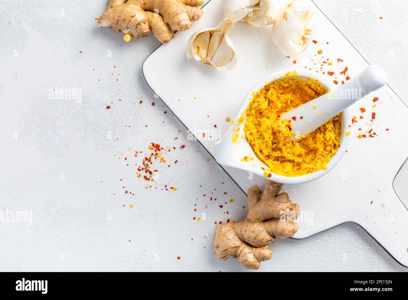 Homemade Fresh Ginger and Garlic paste or Adrak Lahsun puree in ceramic ...