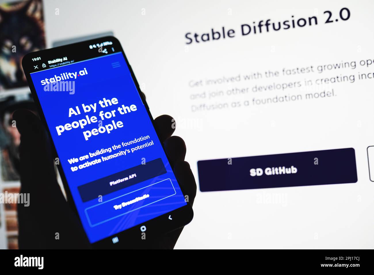 Stability AI web page on phone screen. Stable Diffusion is a deep ...