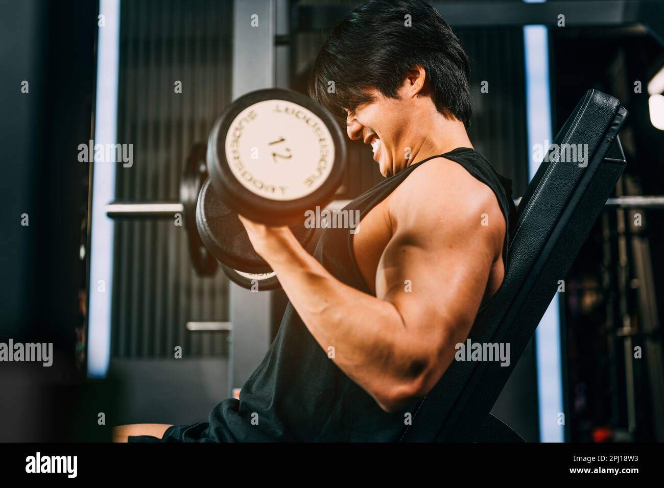 Muscular bodybuilder lifting barbell hi-res stock photography and ...